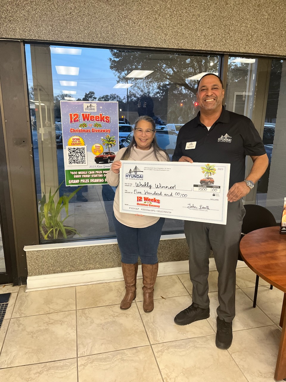 Dec. 8 – Alice E – Winner Photo w Check | 101.7 Chuck FM